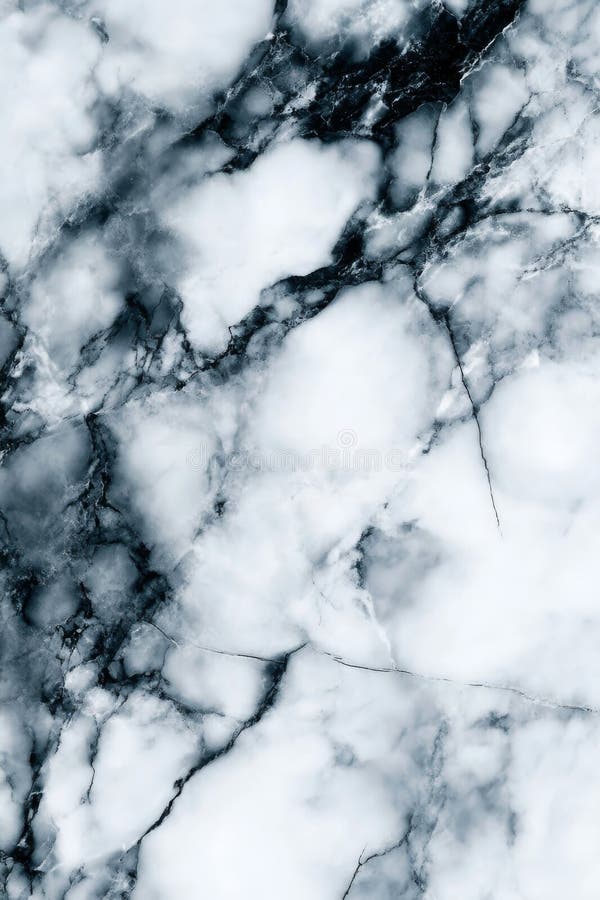 A Refined and Attractive White Marble Backdrop Featuring Swirling ...