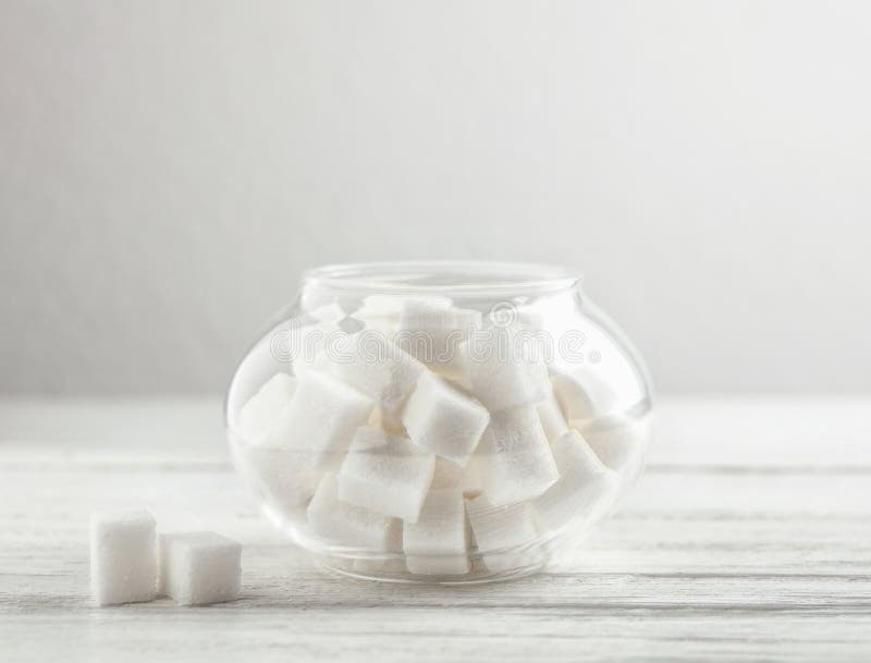 Refined Sugar Cubes in Glass Bowl on Wooden Table Stock Photo - Image ... Refined Sugar Cubes in Glass Bowl on Wooden Table Stock Photo - Image ...