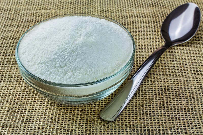 Refined Sugar in Glass Bowl with Spoon beside on Jute Fabric Stock ... Refined Sugar in Glass Bowl with Spoon beside on Jute Fabric Stock ...