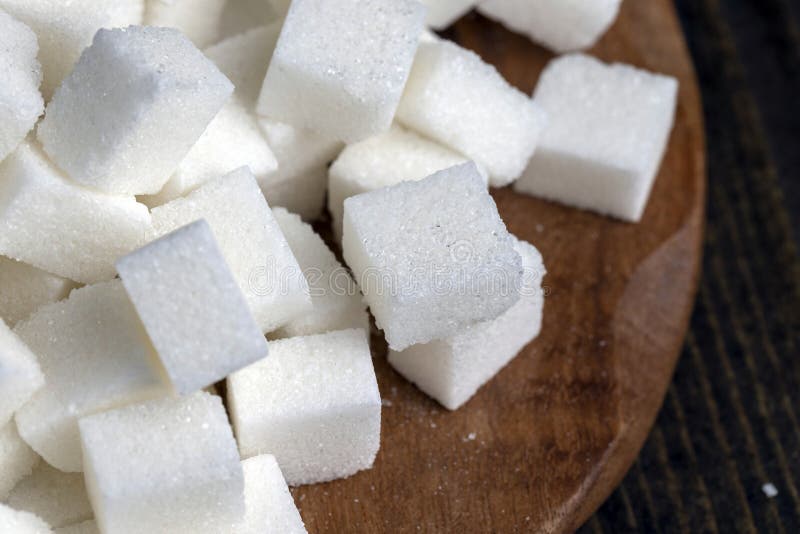Refined White Sugar Cubes in Bowl on Pink Background, Top View. Space ...