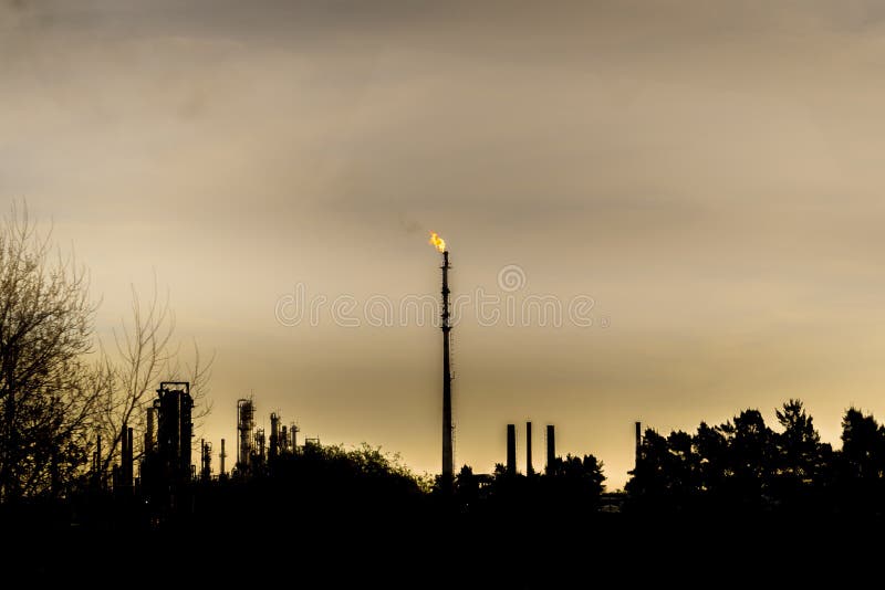 Refinery Chimney Expelling Fire and Smoke Stock Image - Image of long ...