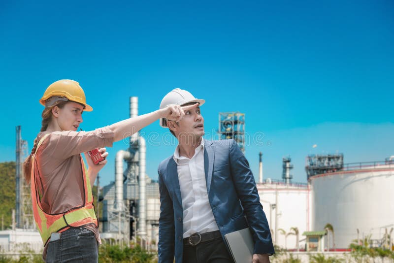 Refinery Oil and Gas Engineer Teamwork Working at Petrochemical Plant ...
