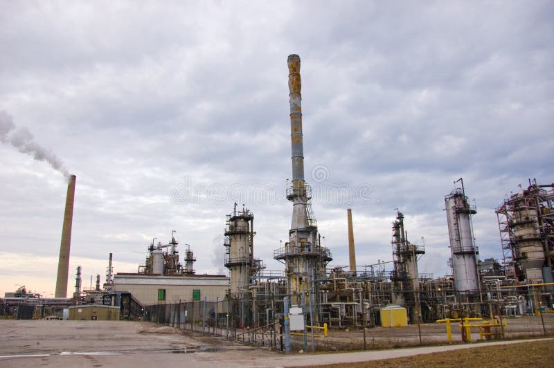 Oil refinery smoke stacks stock photo. Image of industry - 35544234