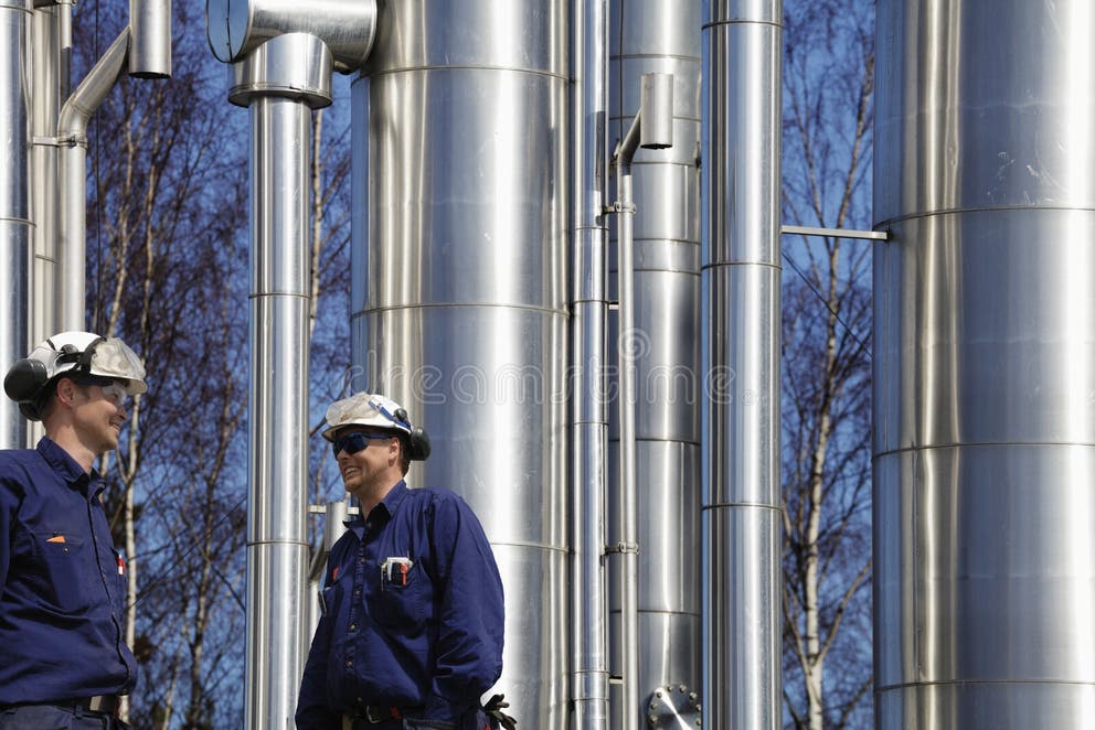 Refinery Workers and Pipelines Stock Image - Image of industrial ...