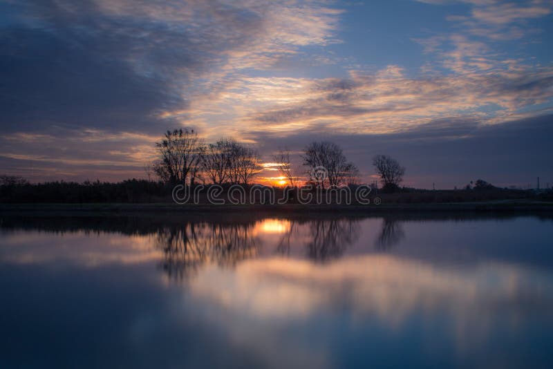 Reflections of a Glass Sunset Stock Image - Image of outdoor, water ...