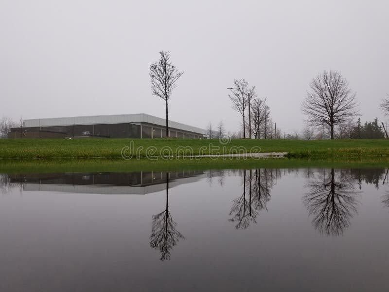 Reflected Building stock image. Image of puddle, reflected - 146098721