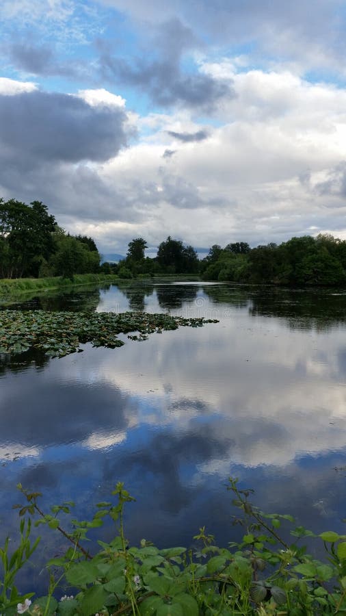 Reflected pond stock image. Image of pond, beauty, clouds - 86201699