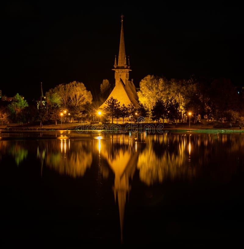 Reflected Wooden Church at Night Stock Photo - Image of symmetry, long ...