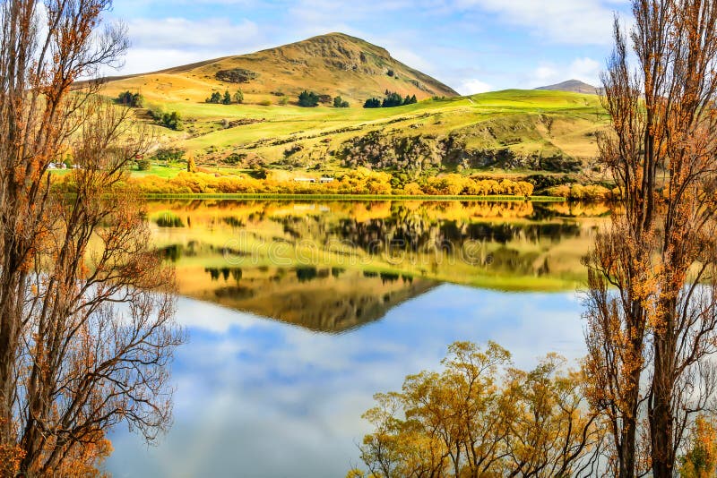 Reflection of Autumn on the Lake Stock Image - Image of queenstown ...