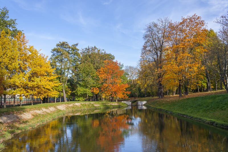 Reflection of Autumn Trees in Water Stock Image - Image of colors ...