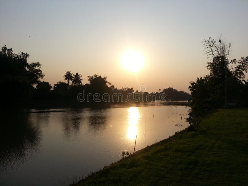 The Reflection on the Banks of the Tha Chin River Stock Image - Image ...