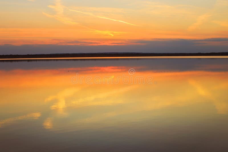 Reflection of a Beautiful Sunset Over the Water Stock Image - Image of ...