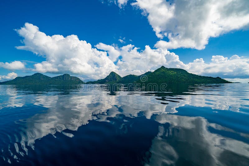 Reflection of a Blissfully Weather Stock Image - Image of marine, clear ...