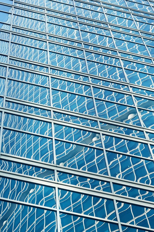 Reflection in Blue Glass Wall of an Modern Office Building Stock Image ...