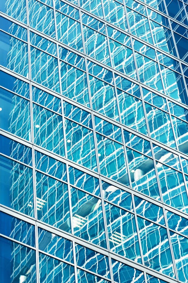 Reflection in Blue Glass Wall of an Modern Office Building Stock Image ...