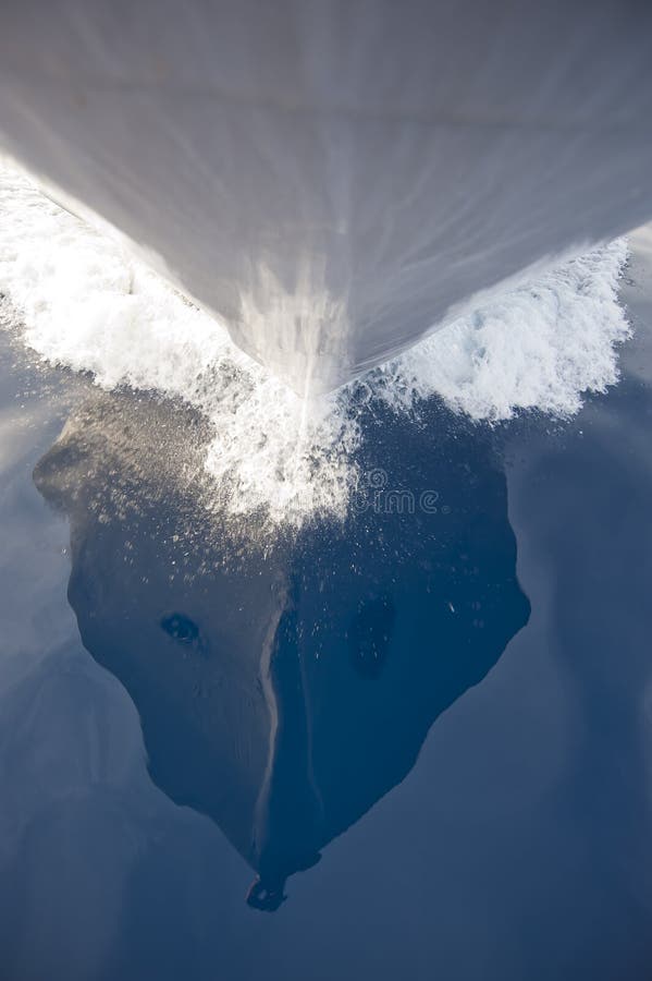 Reflection of Boat Bow in Water Stock Image - Image of reflection, wave ...