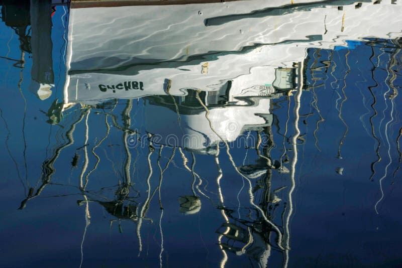 Reflection of Boat in Rippled Water Stock Image - Image of material ...