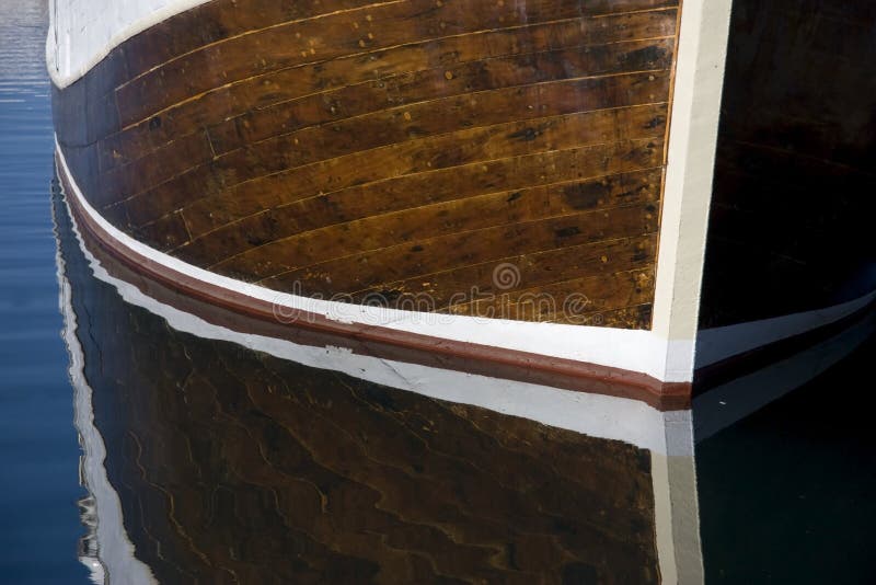 Reflection of a Boat in the Water Stock Photo - Image of reflections ...