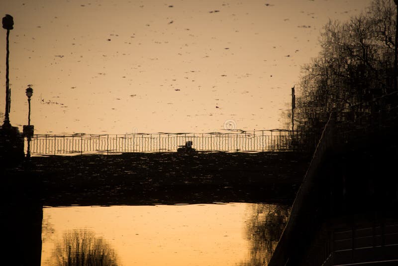 Reflection of Bridge Under the River by Sunset Stock Photo - Image of ...