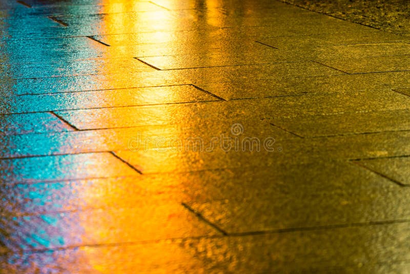 Reflection of Colored Light on the Pavement at the Evening Stock Photo ...