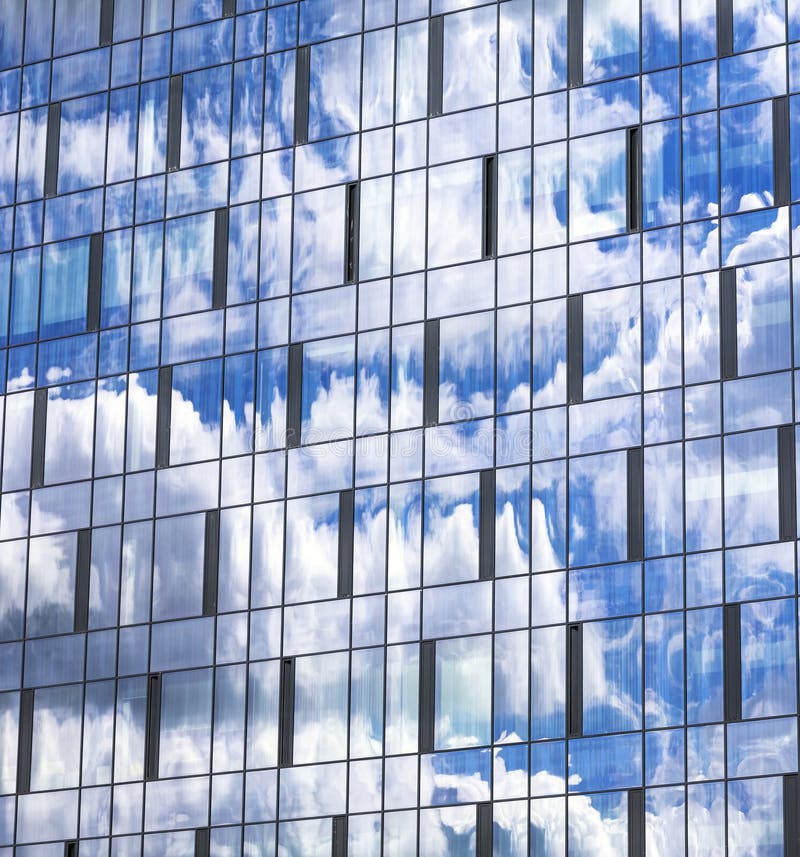 Reflection in the Building Blue Sky with Light Clouds Stock Image ...