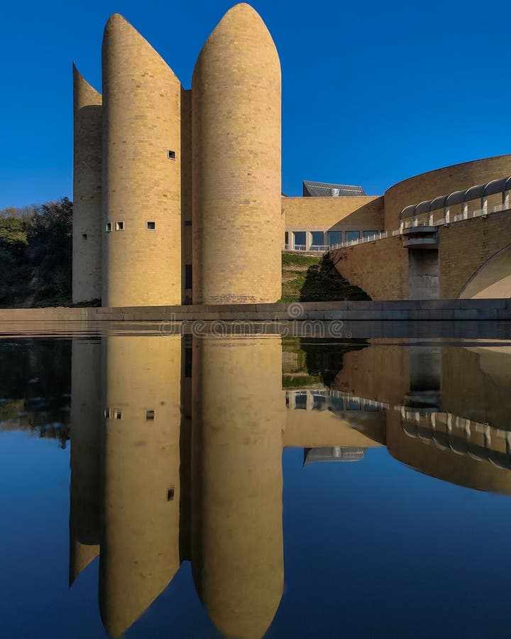 Reflection of a Building on Calm Water Stock Photo - Image of ...