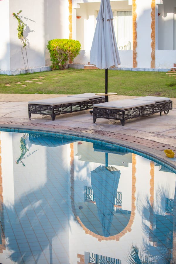 Reflection of a Building in the Pool Water. Stock Image - Image of ...