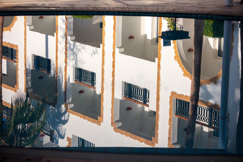 Reflection of a Building in the Pool Water. Stock Image - Image of ...