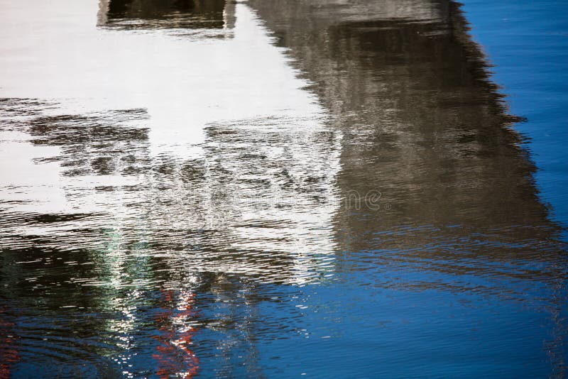 Reflection of a Building on the Surface of Water Stock Image - Image of ...