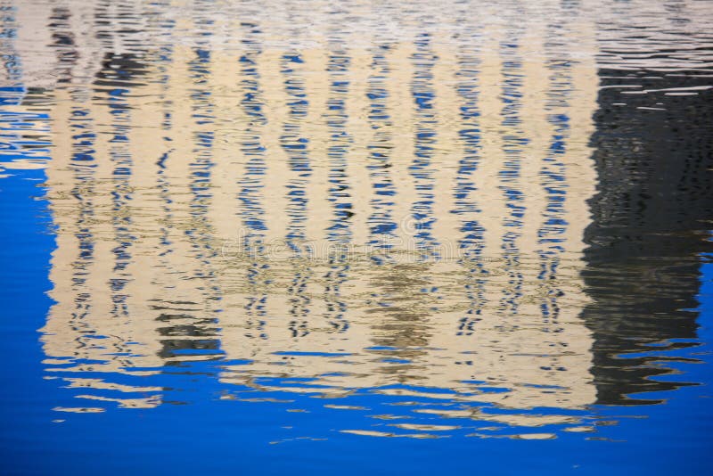 Reflection of a Building on the Surface of Water Stock Image - Image of ...