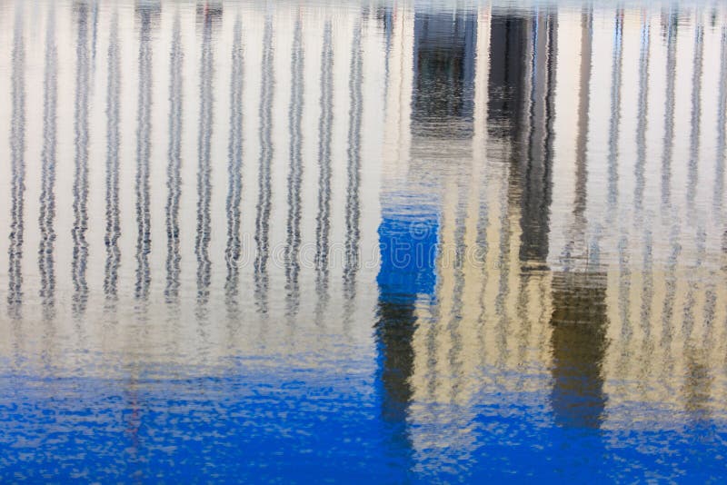 Reflection of a Building on the Surface of Water Stock Photo - Image of ...