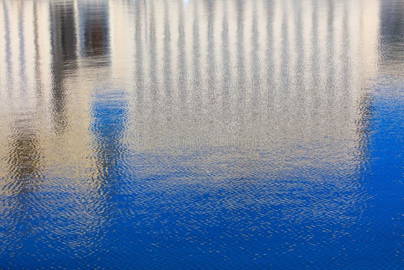 Reflection of a Building on the Surface of Water Stock Photo - Image of ...