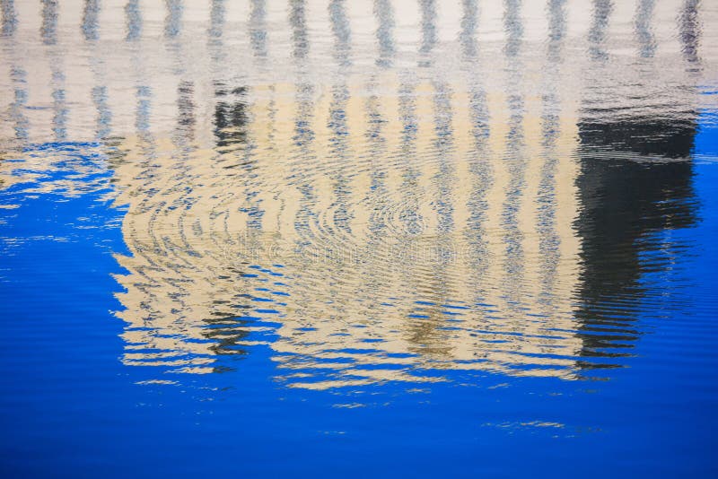 Reflection of a Building on the Surface of Water Stock Image - Image of ...