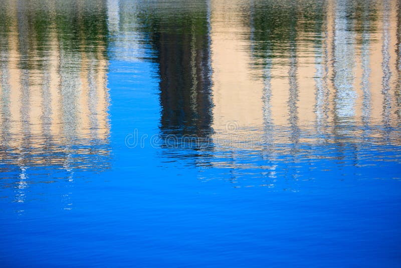 Reflection of a Building on the Surface of Water Stock Image - Image of ...