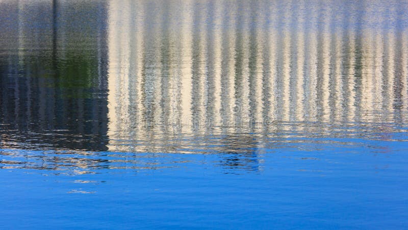 Reflection of a Building on the Surface of Water Stock Image - Image of ...