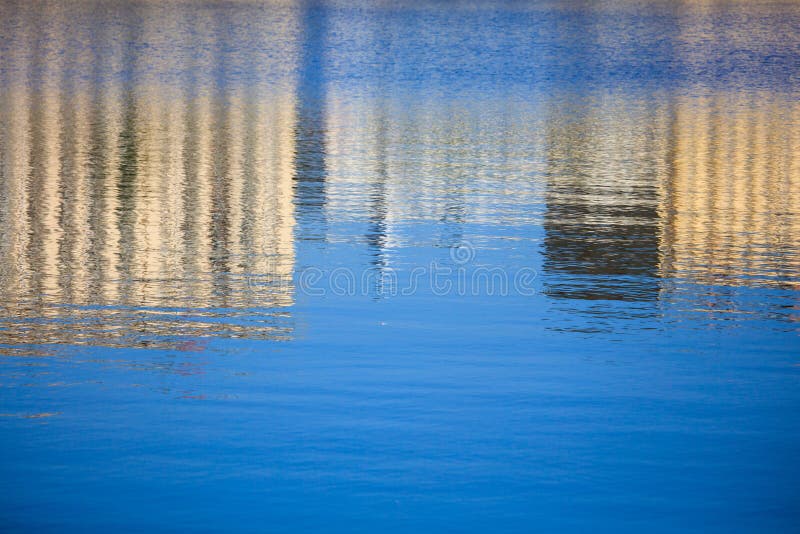 Reflection of a Building on the Surface of Water Stock Image - Image of ...