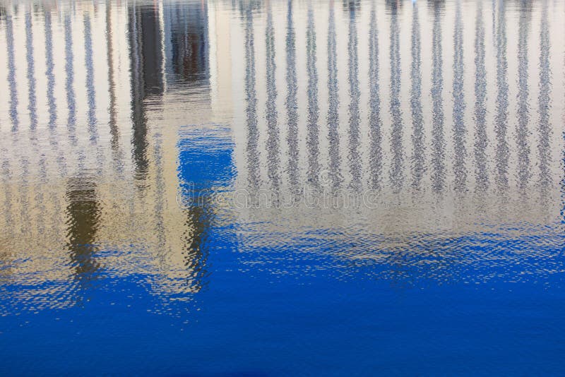 Reflection of a Building on the Surface of Water Stock Image - Image of ...