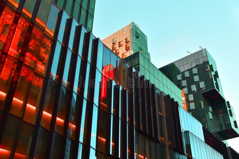 Reflection of Buildings in Windows of Modern Office Building at Sunset ...