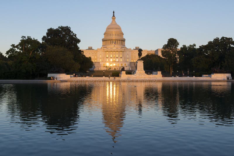 Reflection of Capitol Building in Pool in Light of Setting Sun ...