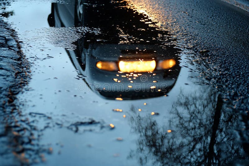 Reflection of a Car in a Puddle after Rain Stock Illustration ...