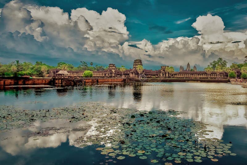 Reflection of the Clouds in the Lake and the Angkor Wat Temple of ...