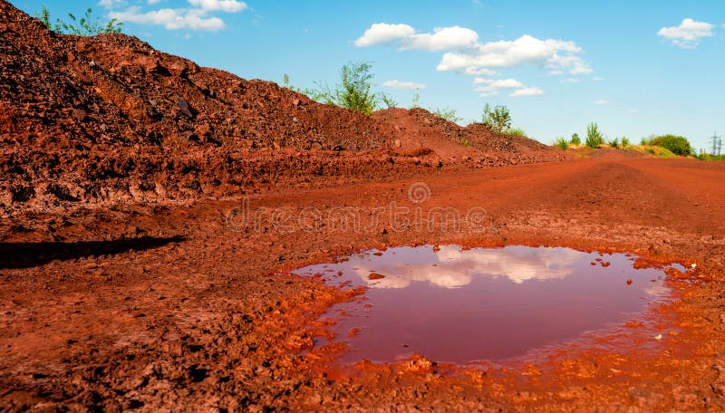 Dry Red Soil with Puddle in Kryvyi Rih, Ukraine Stock Image - Image of ...