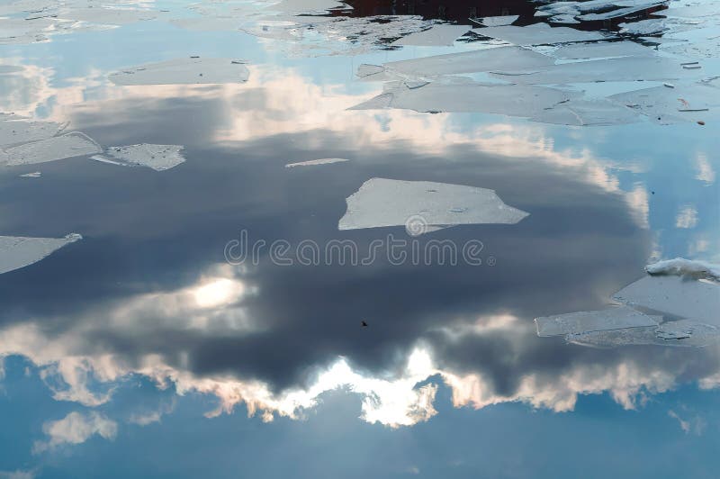 Spring, Reflection Clouds Water, Ice Floats, Sun and Clouds Reflected ...