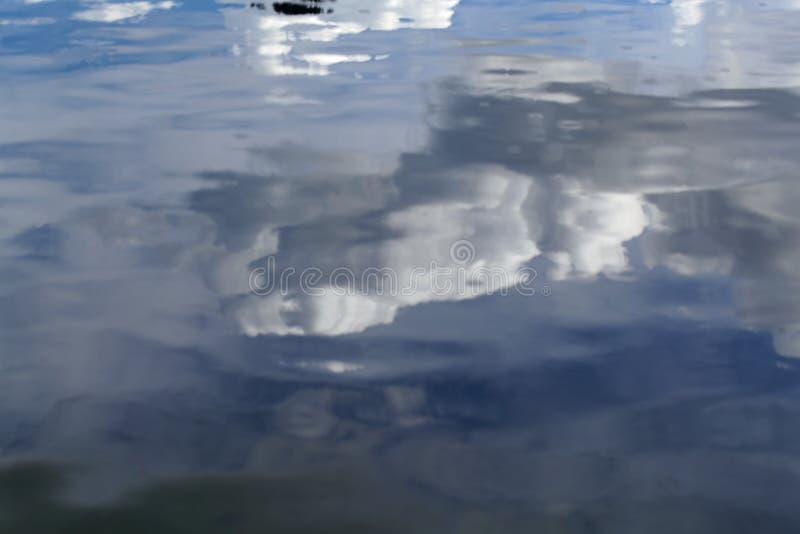 Reflection of Clouds on Water Stock Photo - Image of outdoors, coast ...