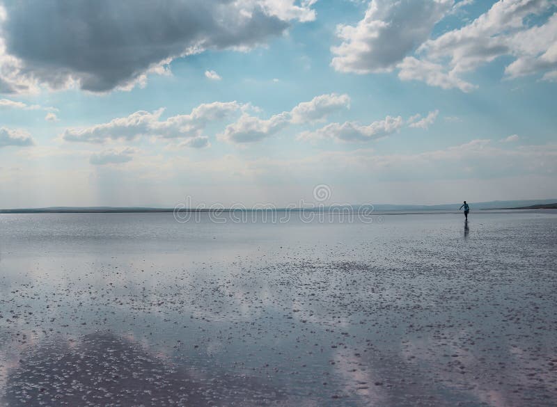 Reflection of Clouds in White Salt Lake Stock Photo - Image of person ...