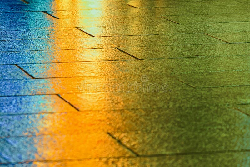 Reflection of Colored Light on the Pavement at the Evening Stock Photo ...