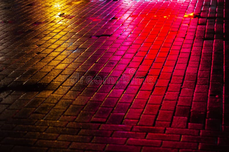 Reflection of Colored Lights on the Pavement at Night. Shine Cobbled ...