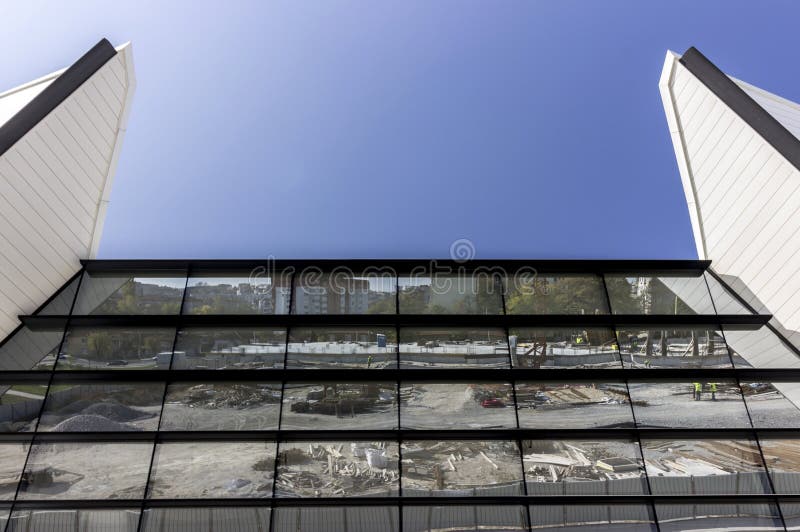 A Reflection of the Construction of a New Building Stock Photo - Image ...