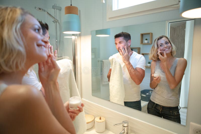 Reflection Couple Touching Face in Bathroom Stock Image - Image of ...