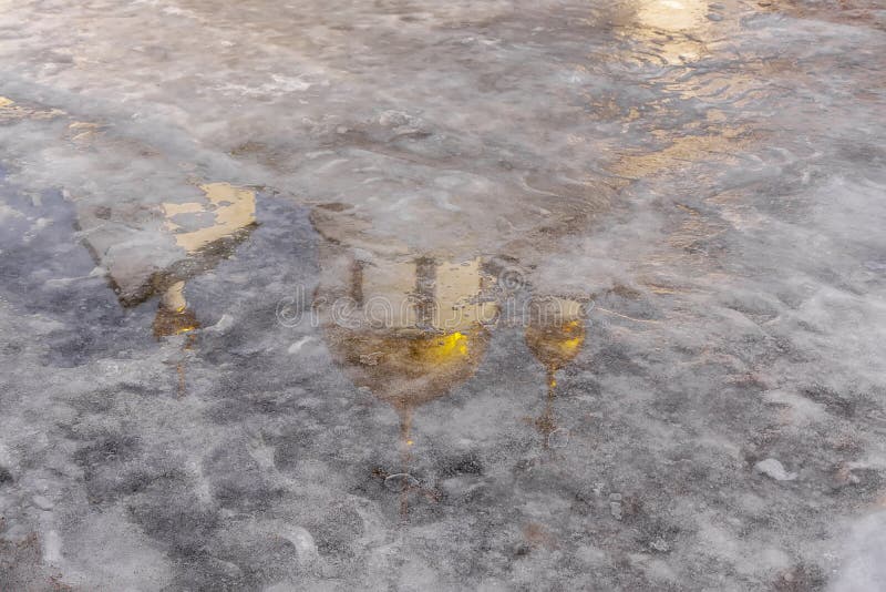 Reflection of the Dome of the Temple in the Frozen Melted Snow Stock ...